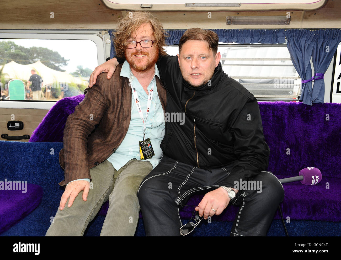 Geoff Lloyd speaks to Sean Ryder (right)backstage at the Absolute Radio ...