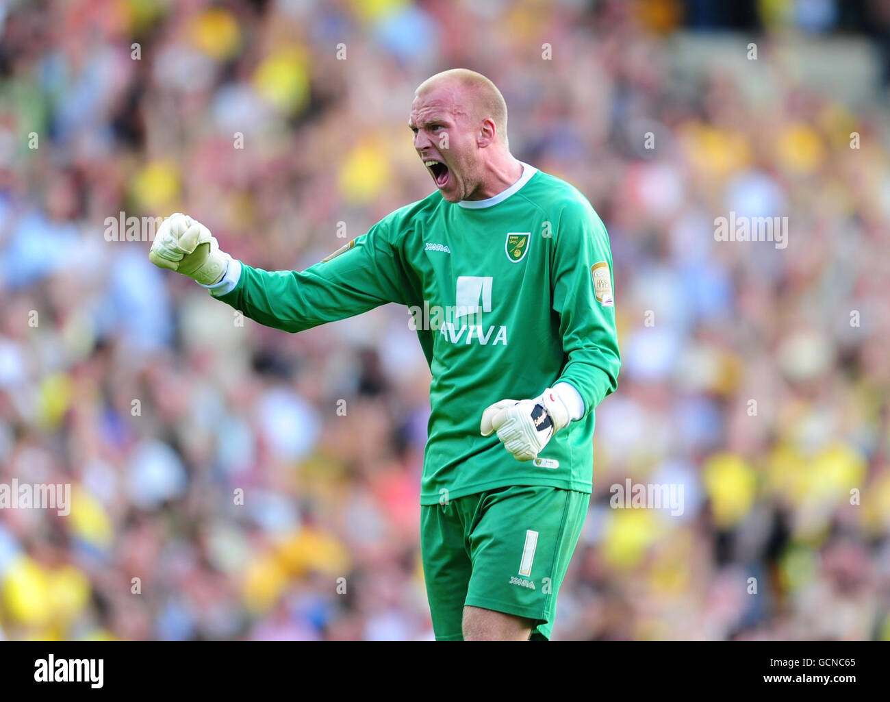 Norwich City's goalkeeper John Ruddy celebrates saving a penalty from ...