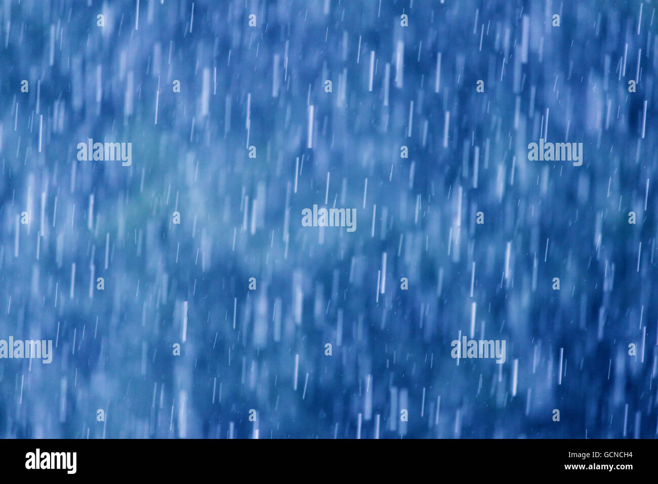 Rain on blue Stock Photo - Alamy
