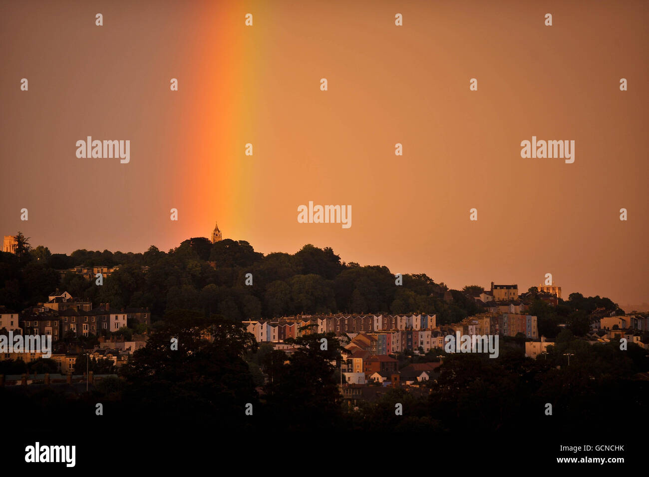 A spectacular storm over the city of Bristol causes a rainbow to form ...