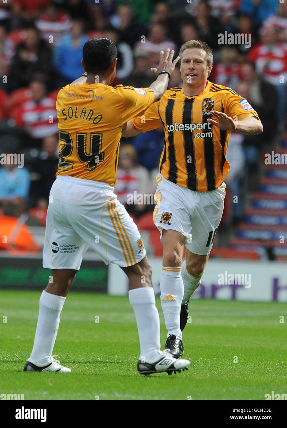 Hull's Nick Barmby (right) celebrates his goal with Nolberto Solano ...