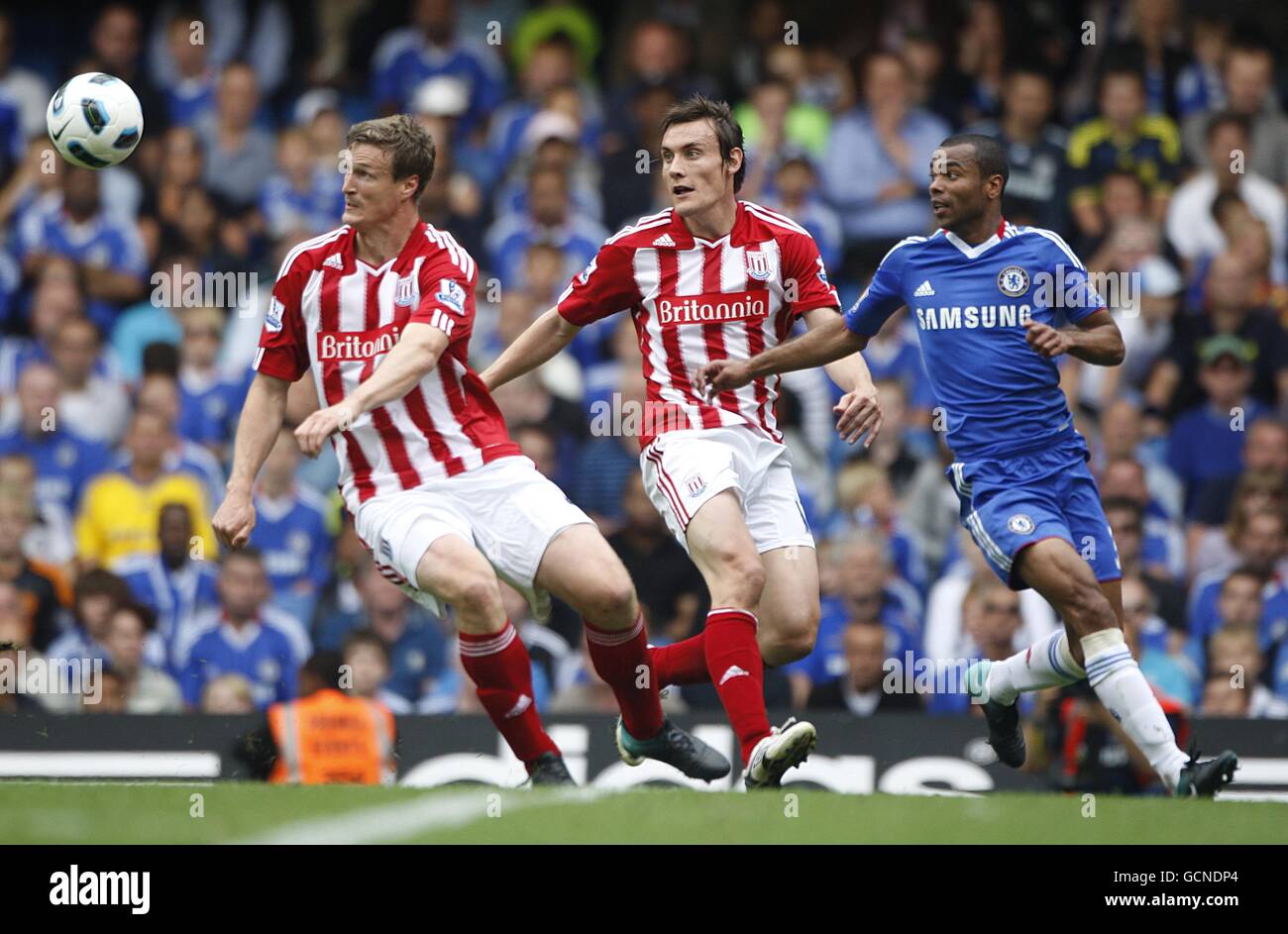 Stoke City's Robert Huth (left) and Dean Whitehead (centre) in action ...