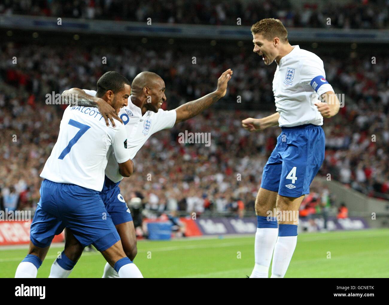 Englands theo walcott left celebrates scoring his goal hi-res stock ...