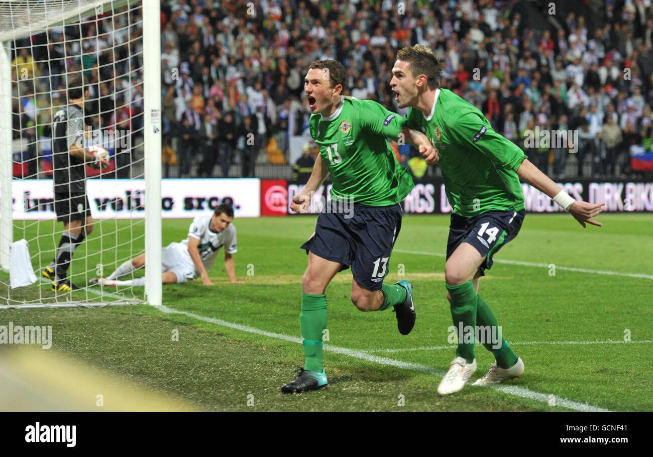 Northern Ireland's Corry Evans celebrates scoring with Kyle Lafferty ...