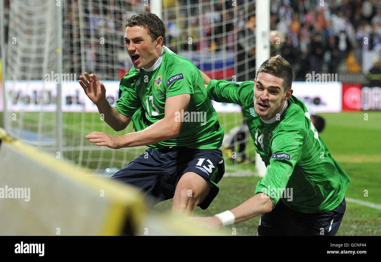 Northern Ireland's Corry Evans celebrates scoring with Kyle Lafferty ...