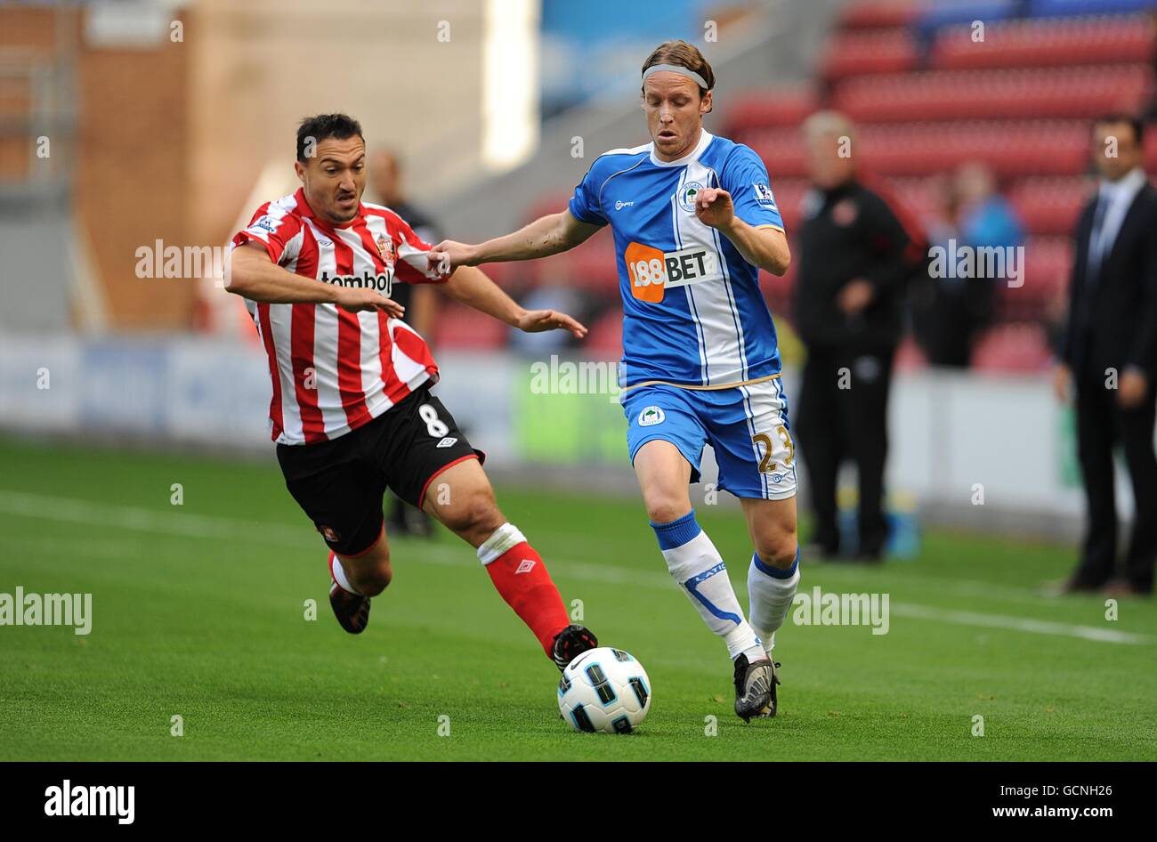 Wigan Athletic's Ronnie Stam (right) and Sunderland's Steed Malbranque ...