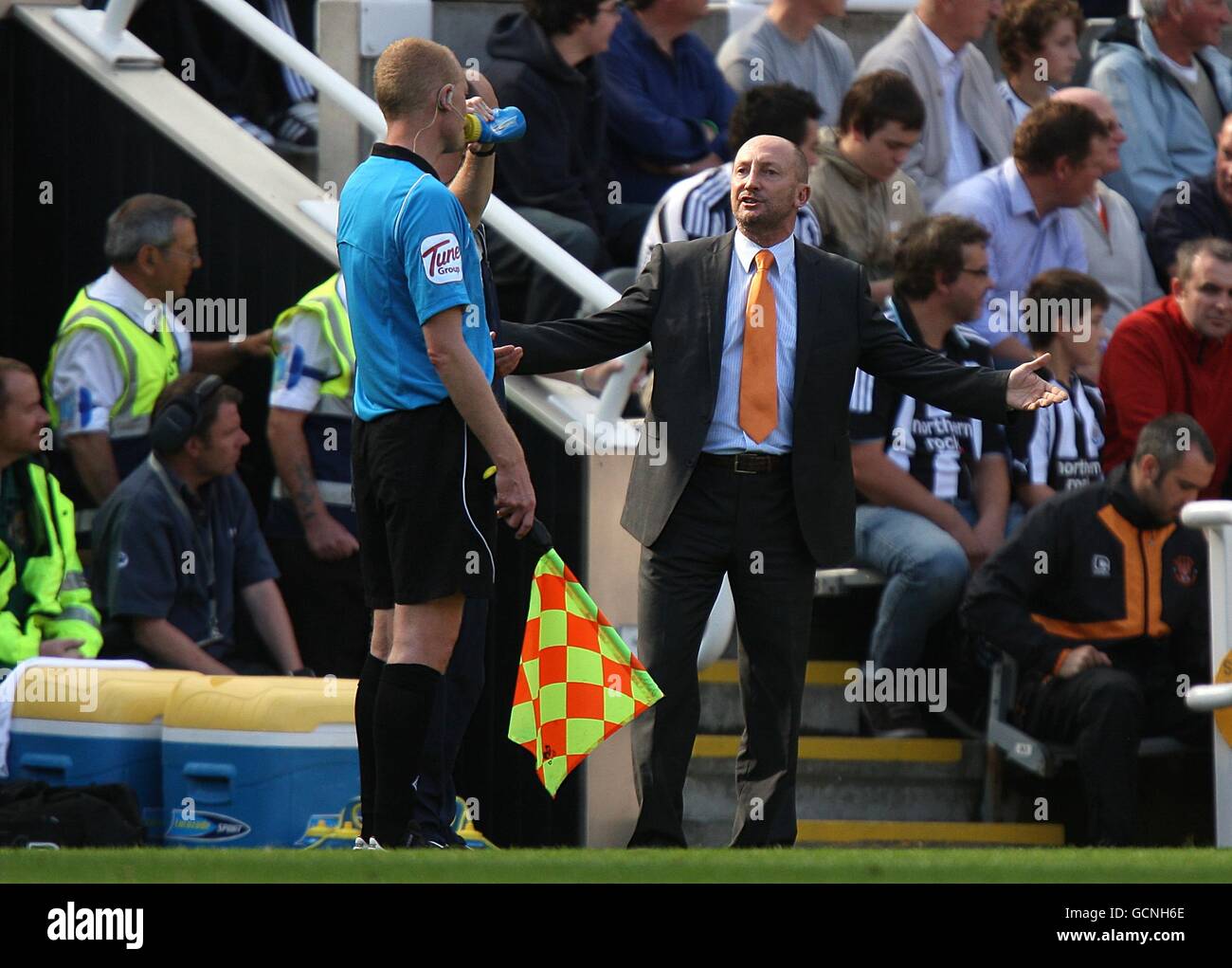 Blackpool manager Ian Holloway shares his opinion with the linesman on ...
