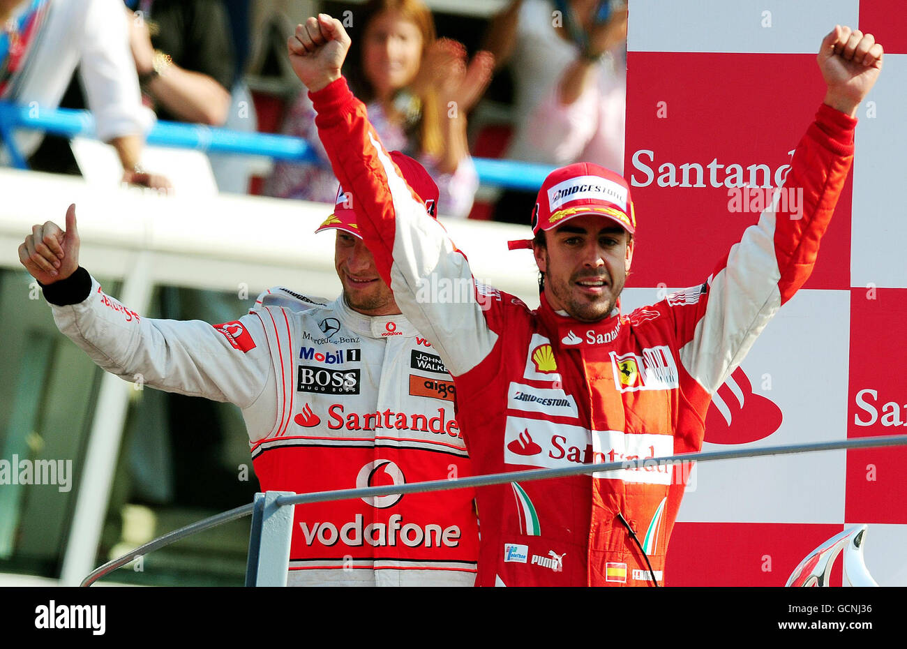 Ferrari's Fernando Alonso of Spain celebrates on the podium after ...