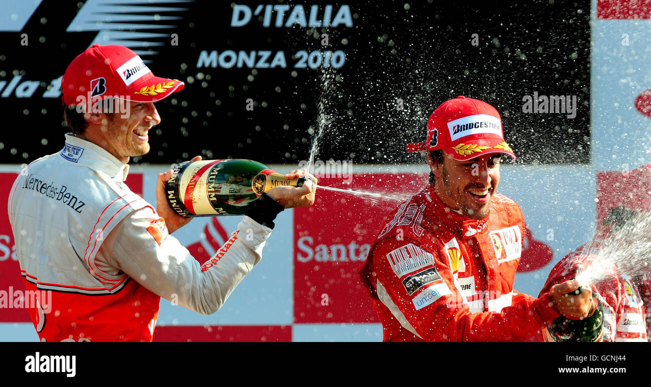 Ferrari's Fernando Alonso of Spain celebrates on the podium after ...