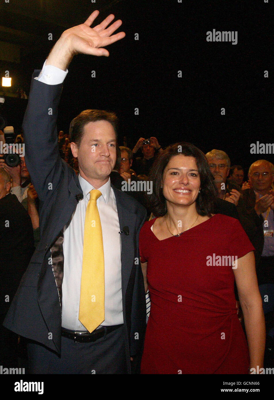Deputy Prime Minister Nick Clegg waves alongside his wife Miriam ...