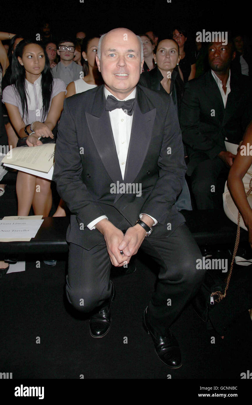 Ian Duncan Smith seated on the front row for the Issa Spring/Summer ...