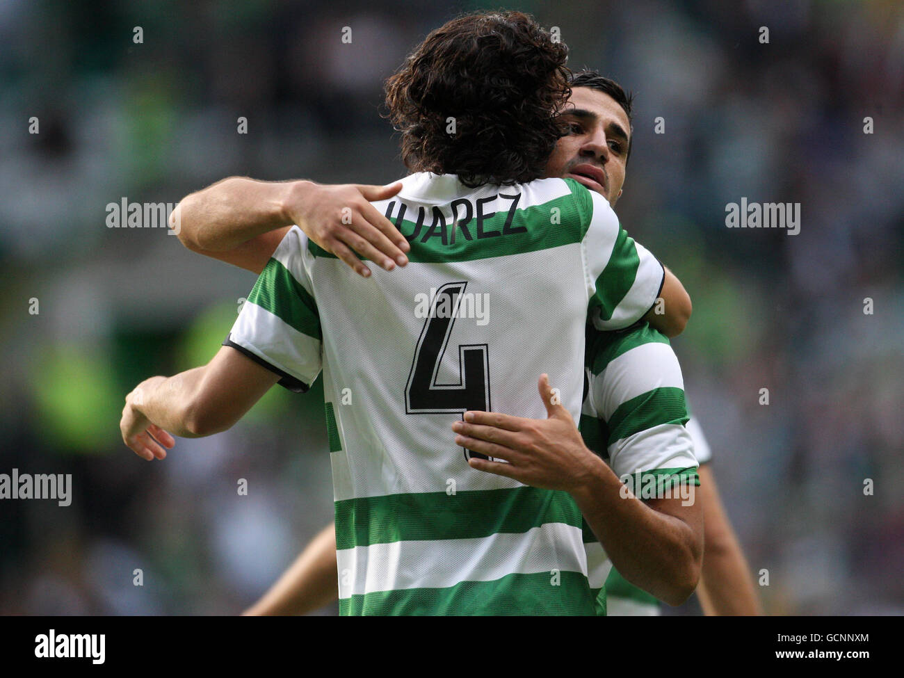 Celtic's Efrain Juarez celebrates the first goal with Beram Kayal ...