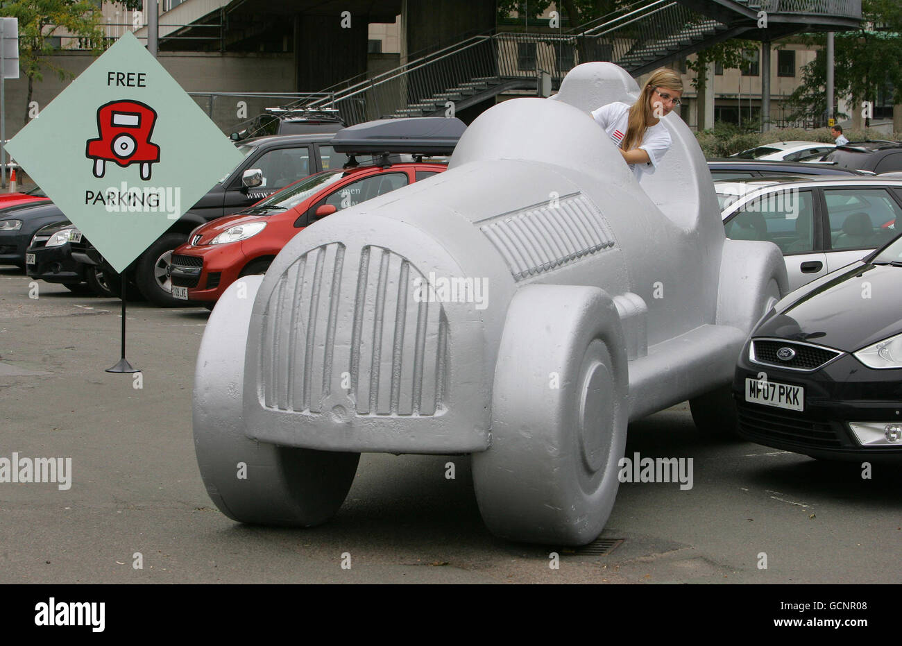 Victoria Jon with a huge Monopoly car as Monopoly celebrates 75 years ...
