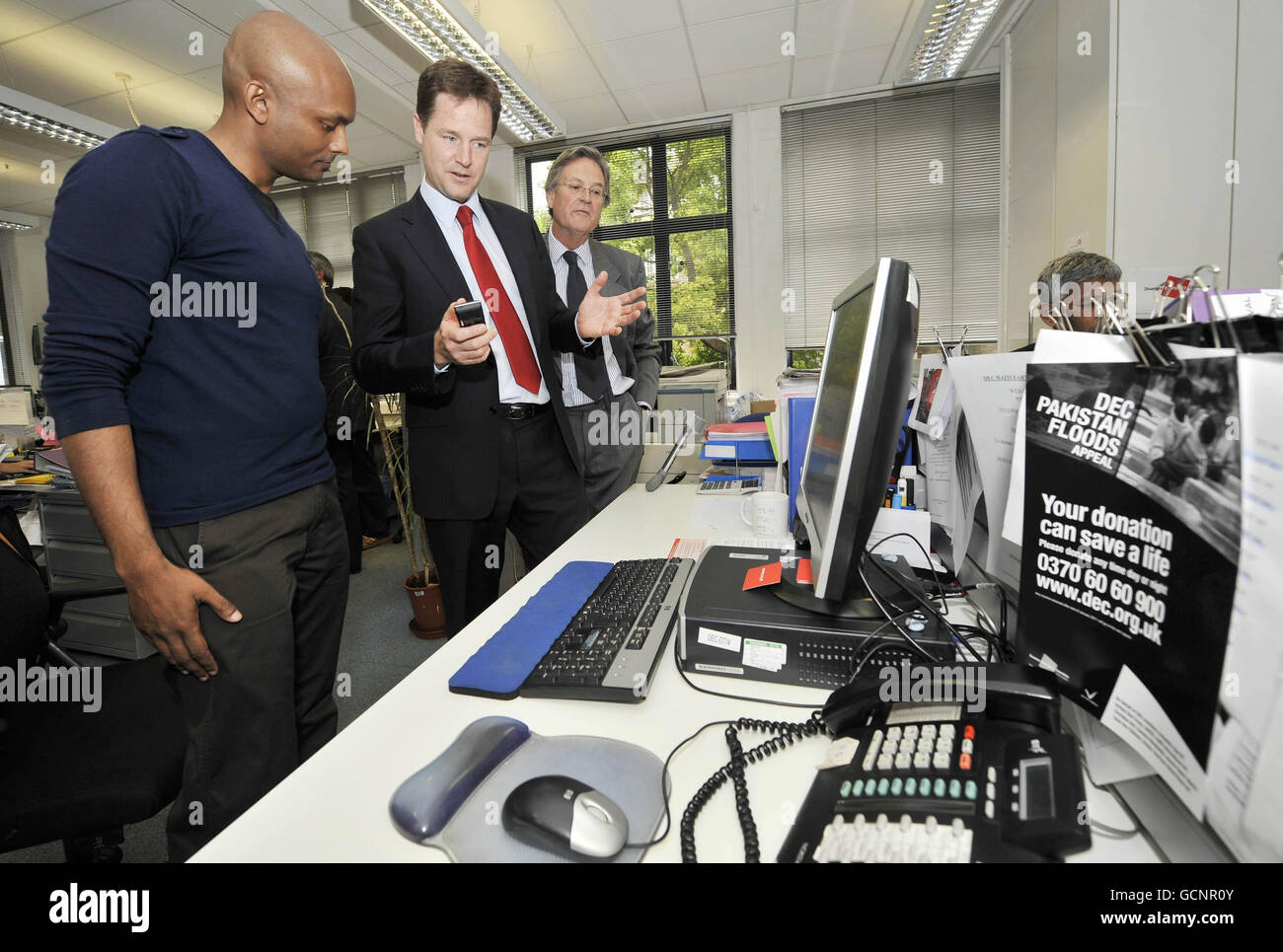 Nick Clegg visits the Disasters Emergency Committee headquarters Stock ...