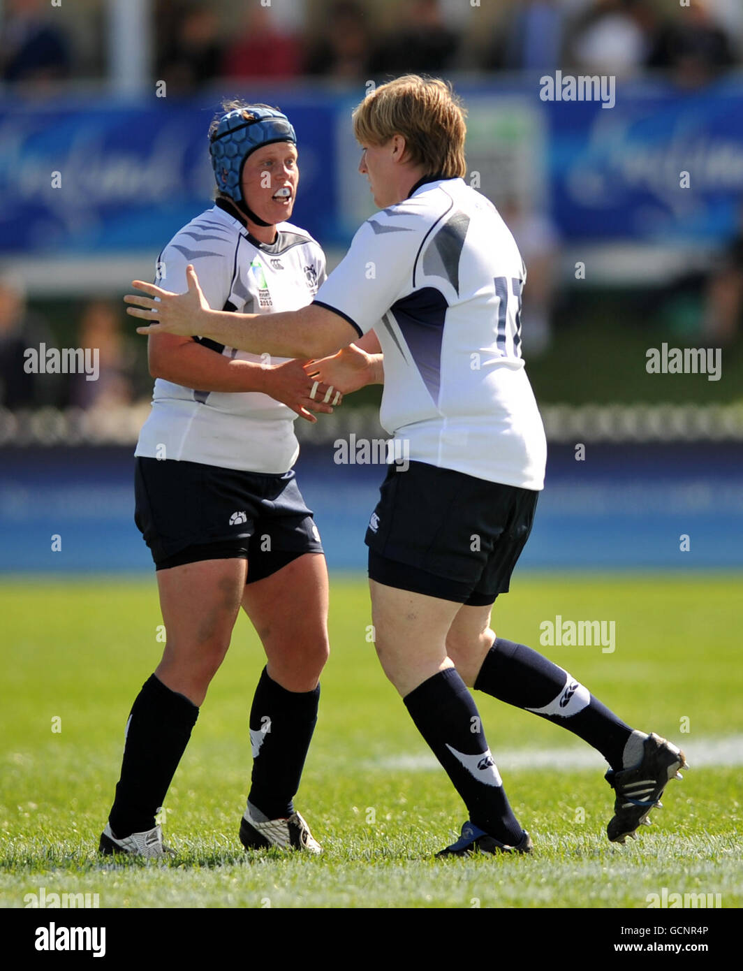 Scotland's Gillian McCord (right) shakes hands with Beth Dickens as she ...