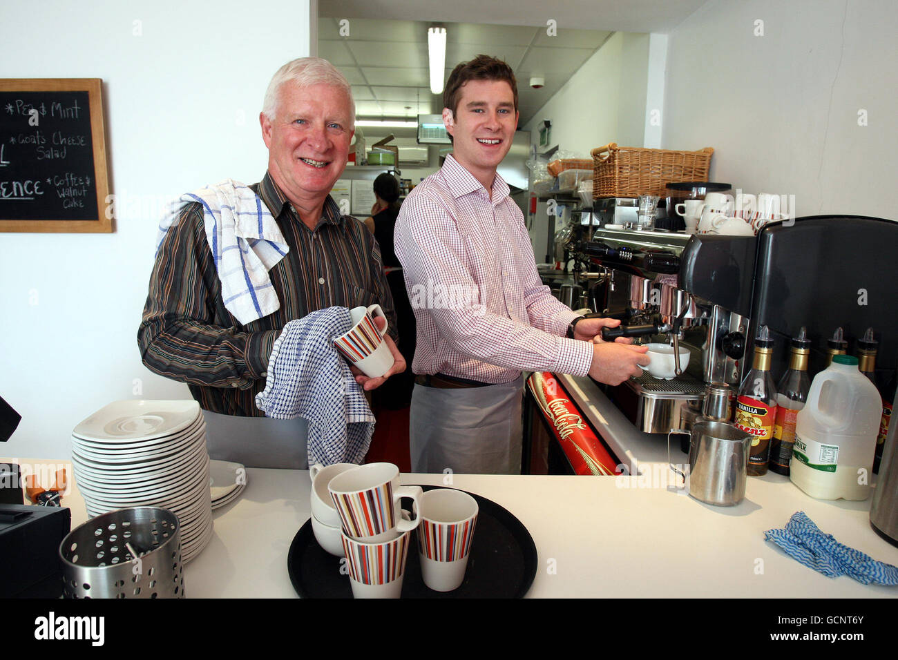 Chris McCabe works with son Stock Photo - Alamy
