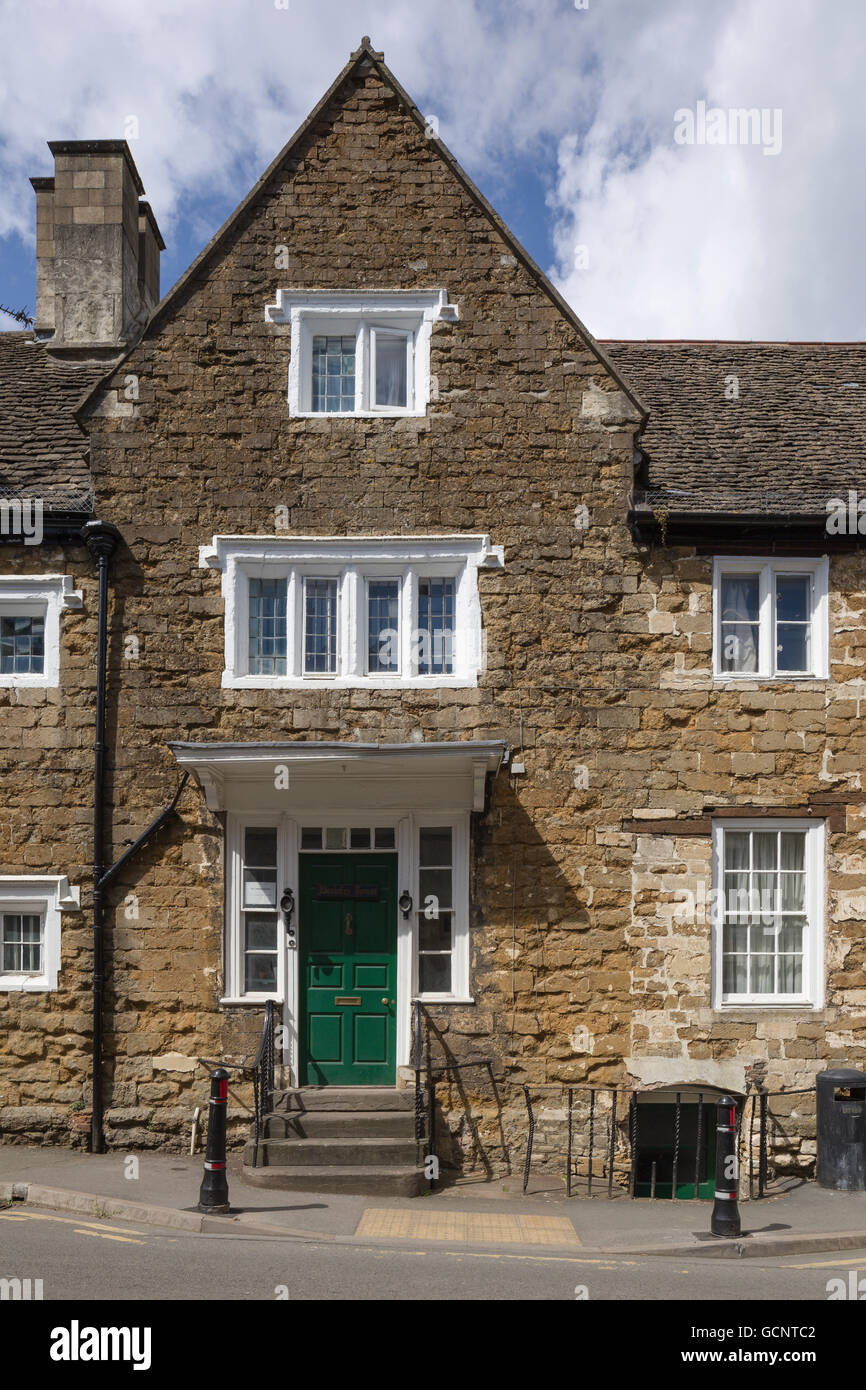 A 17th-century historic vernacular stone house with mullioned windows ...