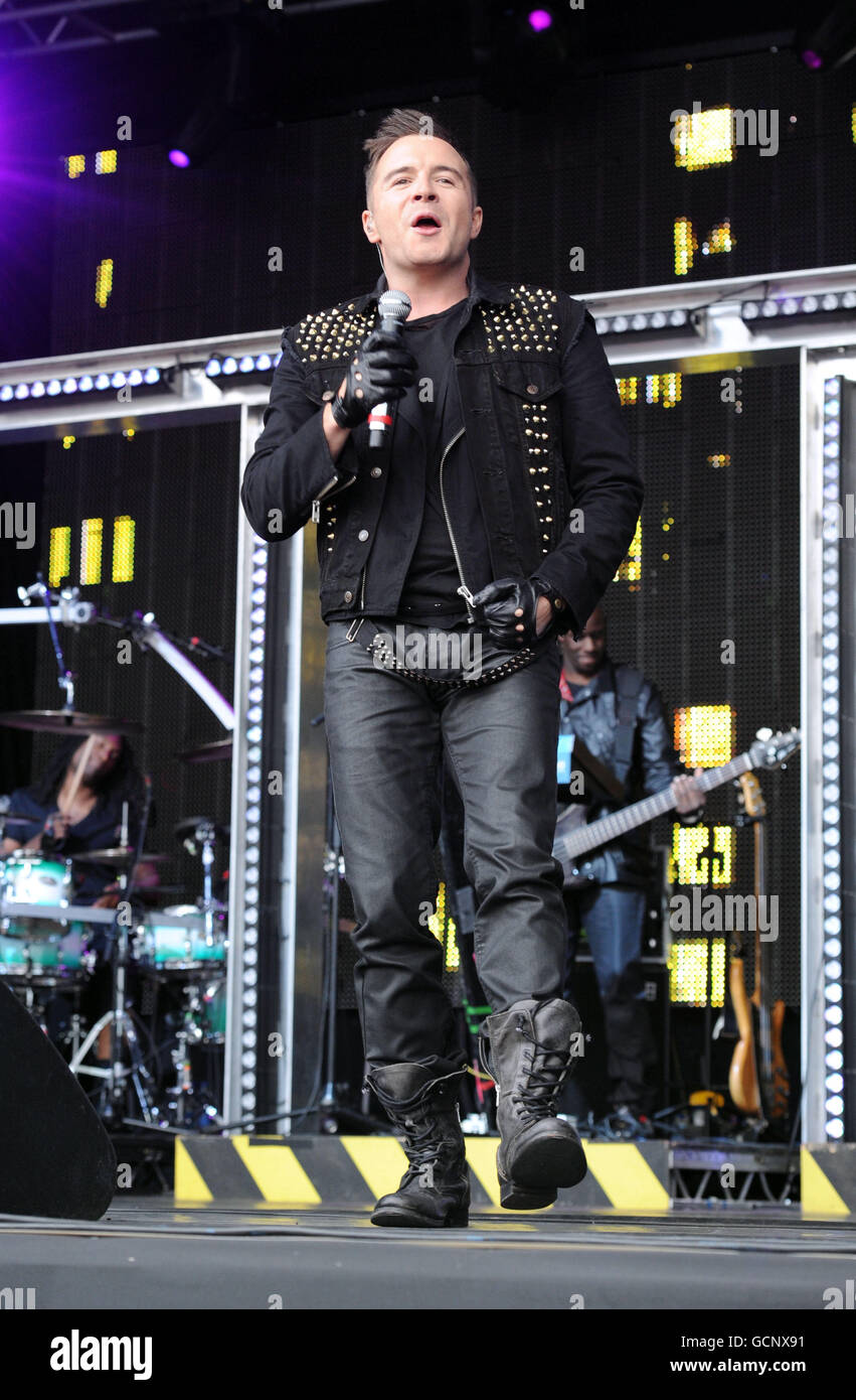 Shane Filan of Westlife performs on stage during Ladies Day at Newbury ...
