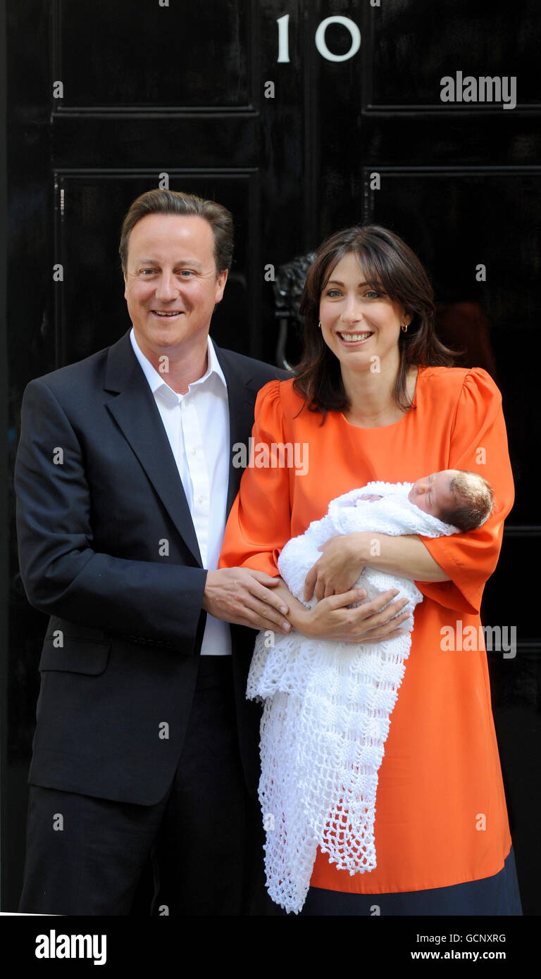 Prime Minister David Cameron and his wife Samantha with their baby ...