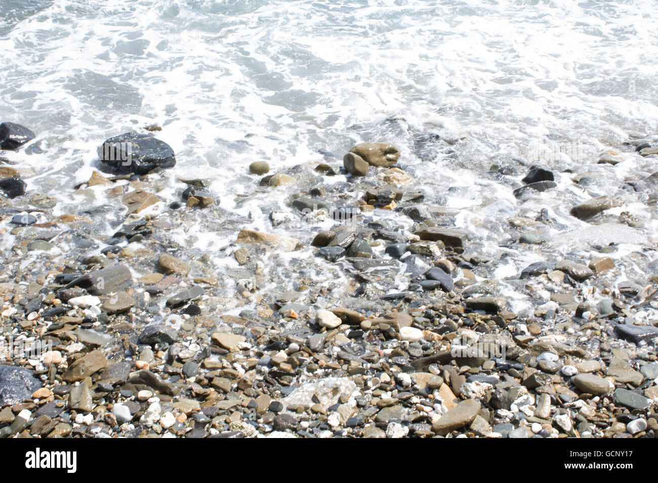 Pebbles by the ocean hi-res stock photography and images - Alamy