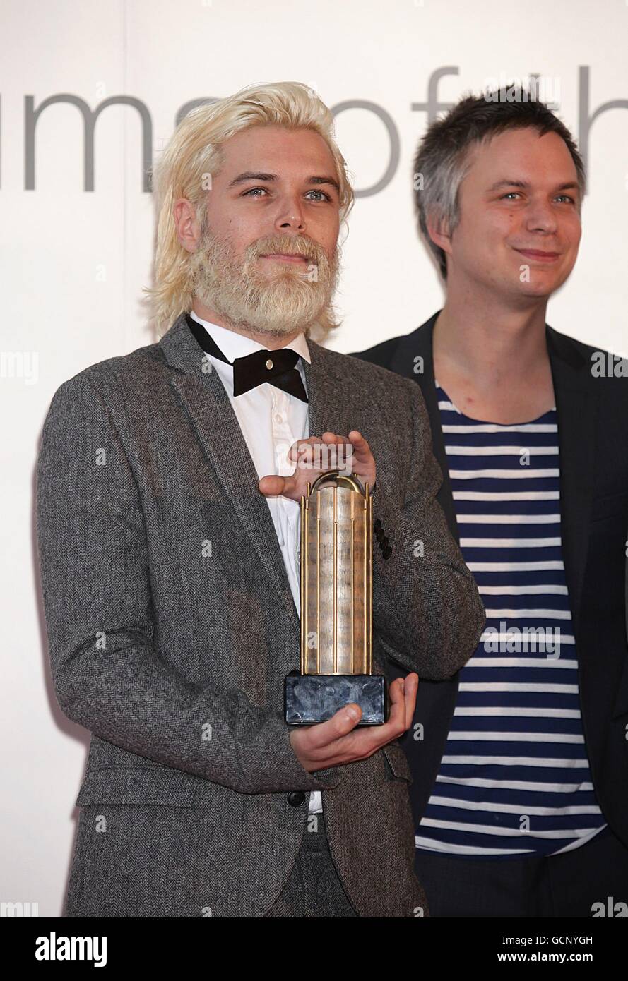 Simon Neil (right) and Mike Vennart of Biffy Clyro arriving for the ...