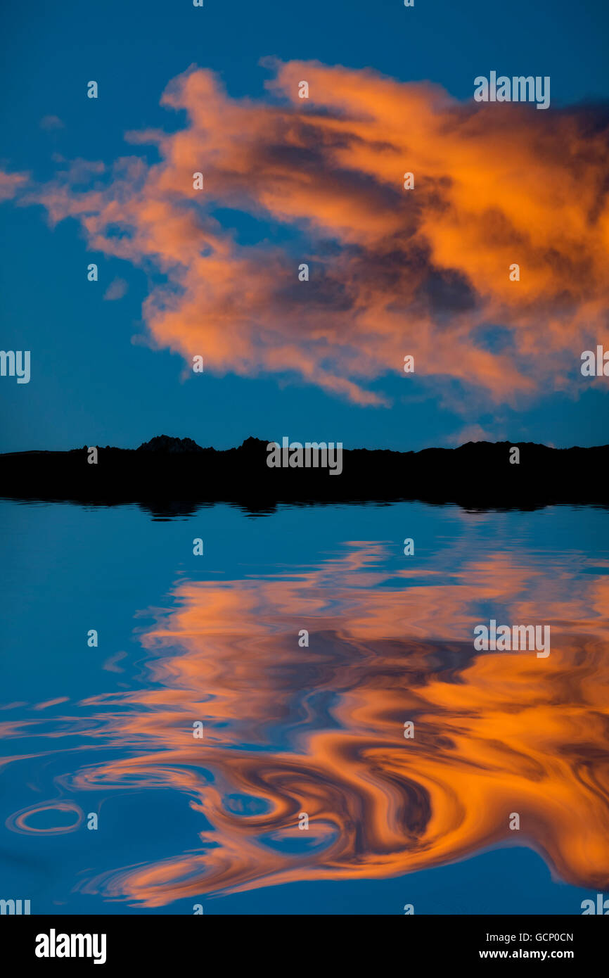 Red sky and clouds reflecting in digitally created water Stock Photo ...