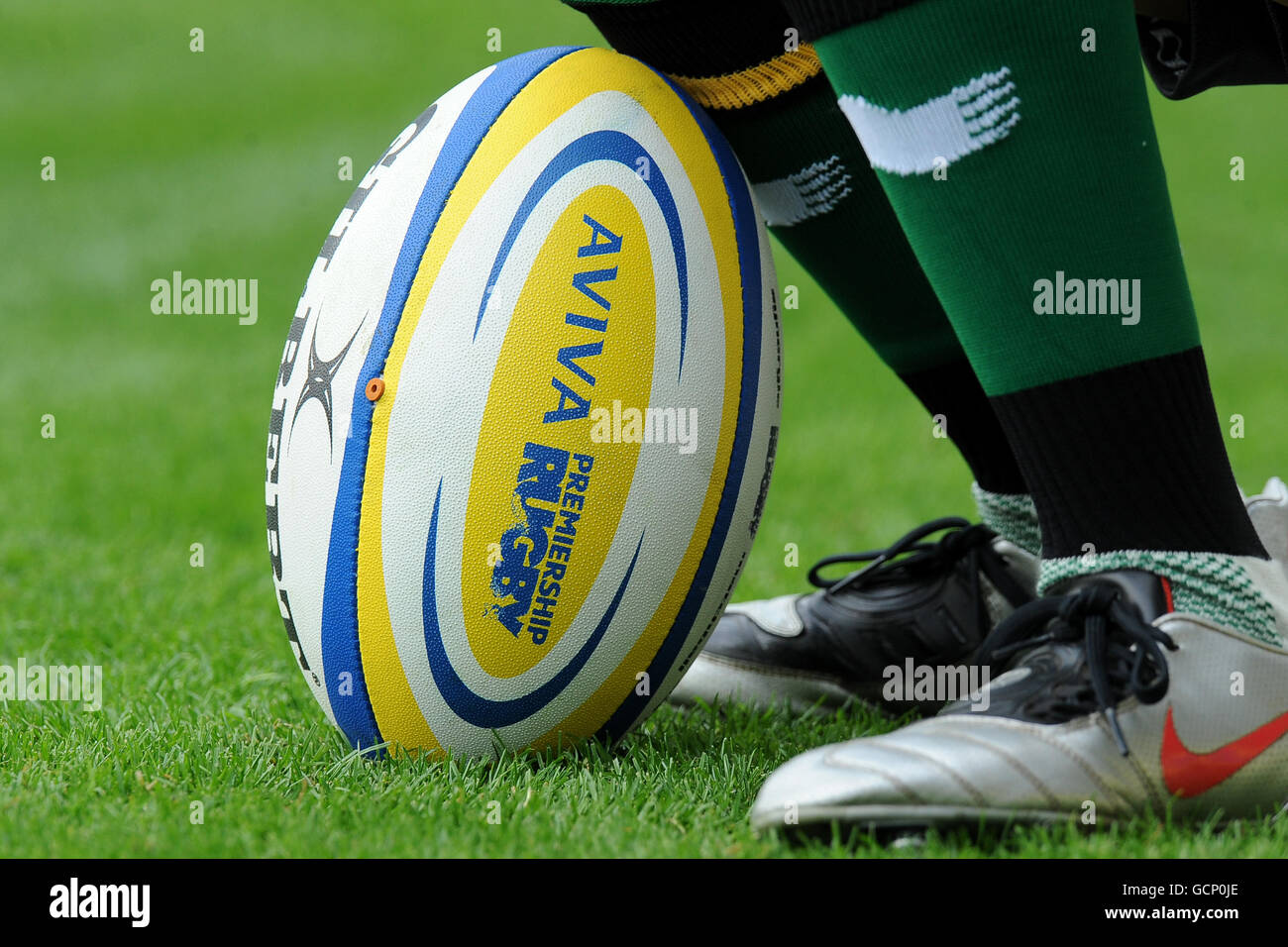 A ballboy holds an aviva branded gilbert synergie matchball hi-res ...