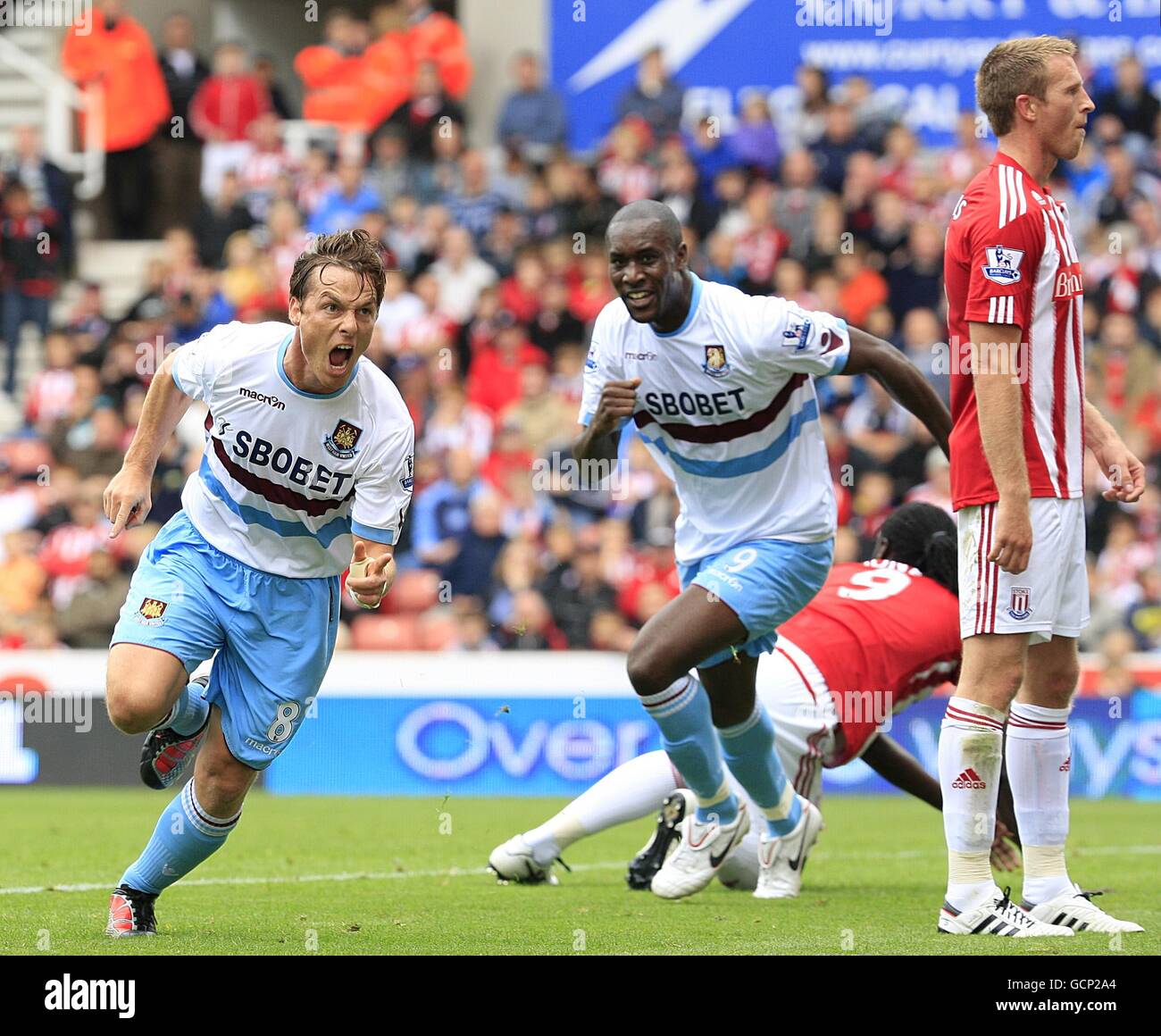 West Ham United's Scott Parker (left) celebrates scoring his side's ...