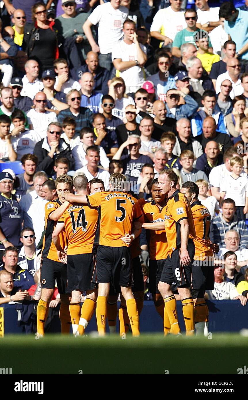 Wolverhampton Wanderers' Steven Fletcher (obscured) is mobbed by team ...