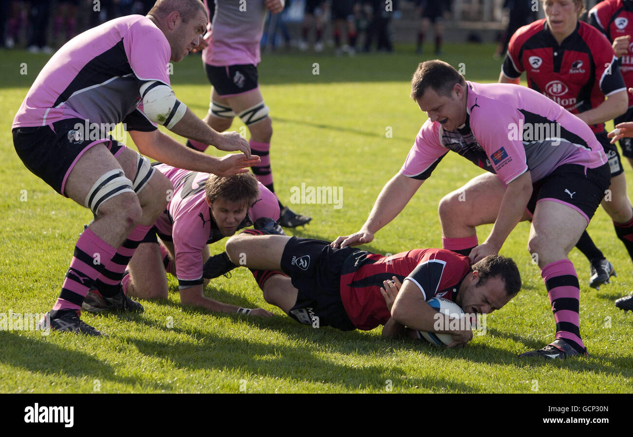 Glasgow Hawks Michael Adamson is tackled by Ayr during the Scottish ...