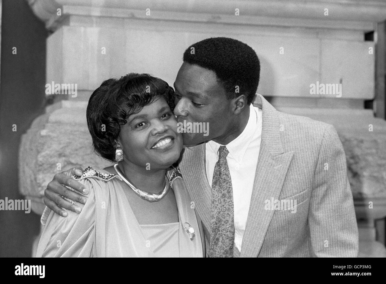 A kiss for Zita Andrew, of Stratford, east London, from her son Sky ...