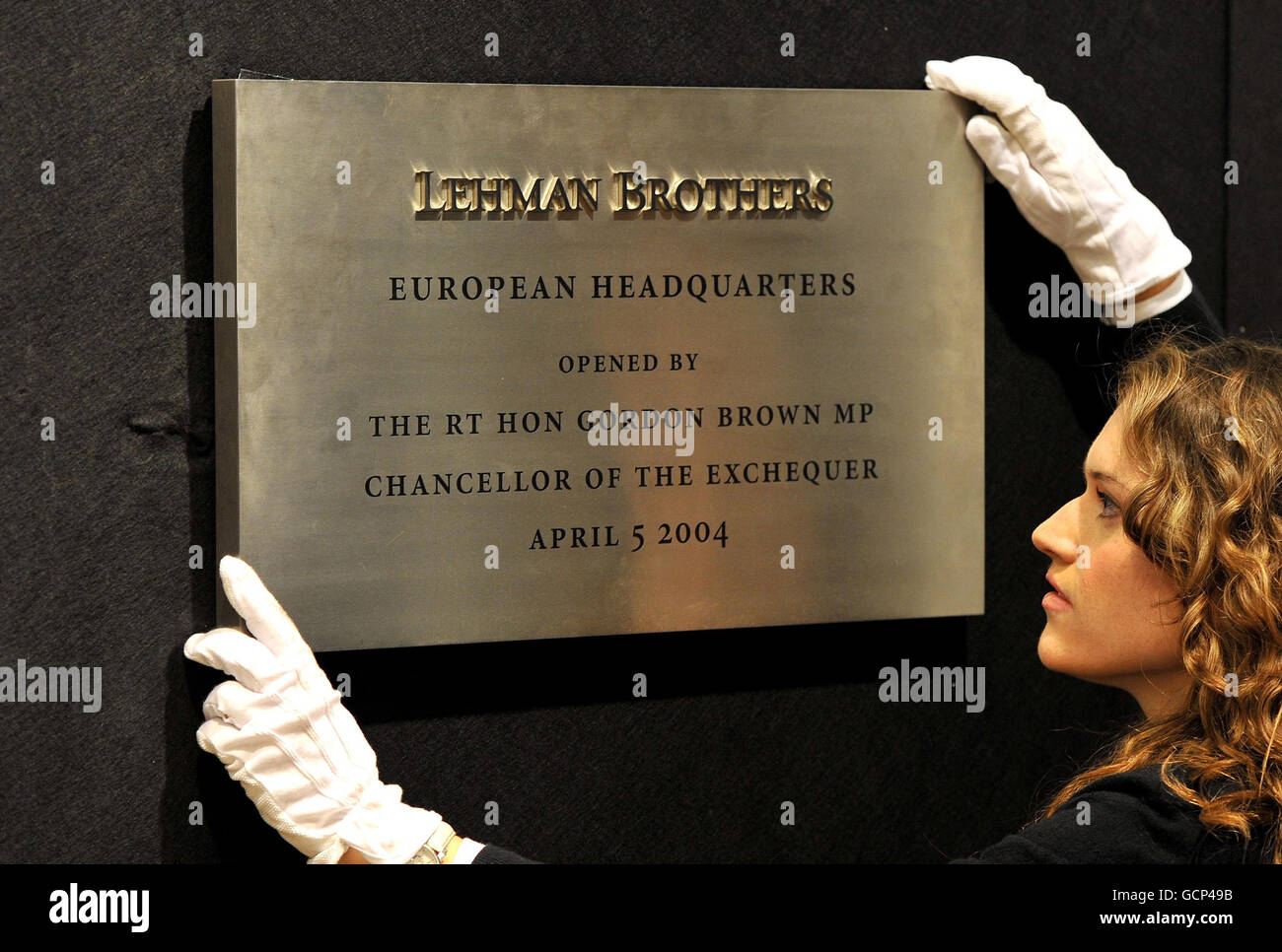 Christie's employee Eryn Brobyn adjusts artwork from the Lehman ...
