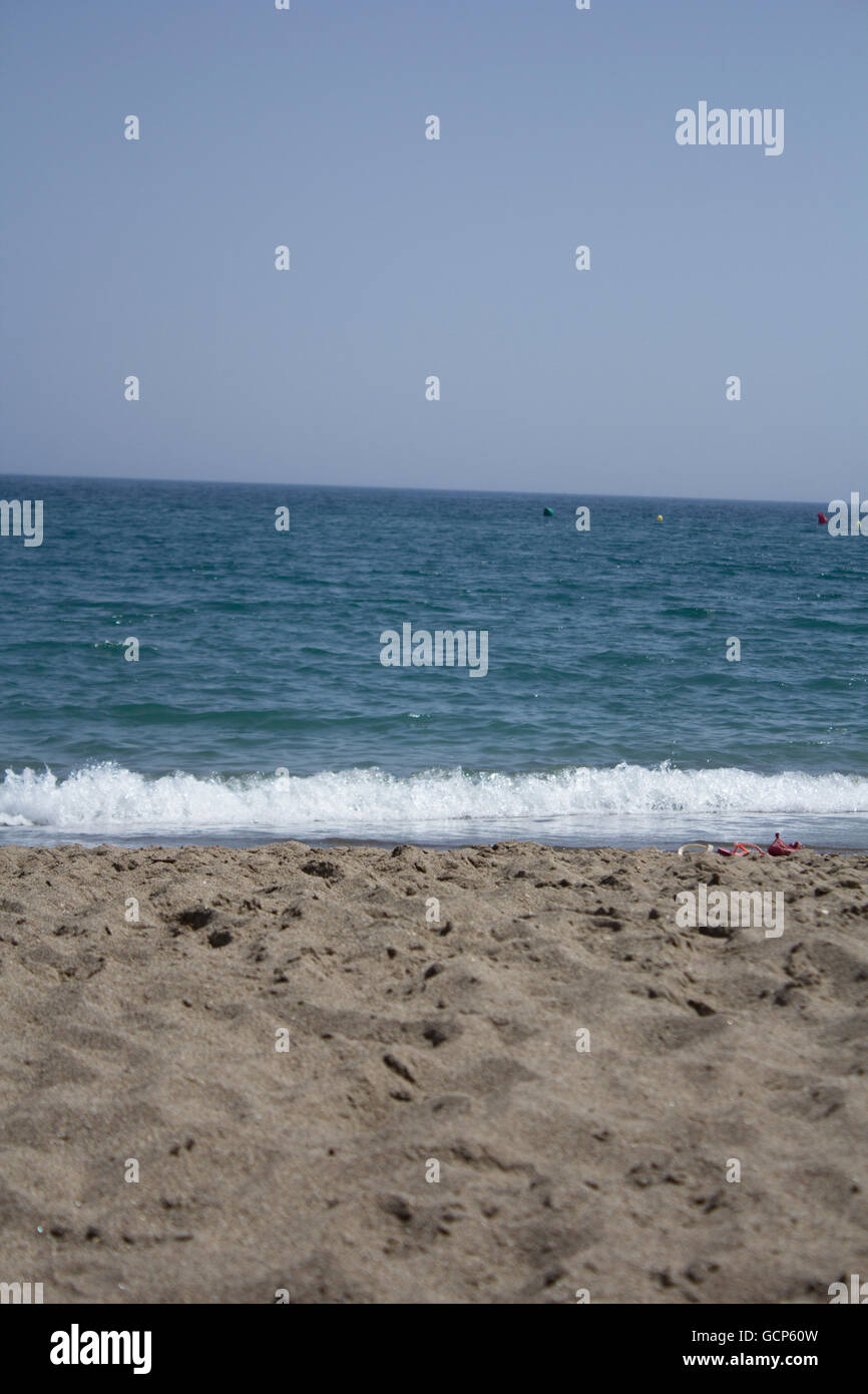 Calm beach waves hi-res stock photography and images - Alamy