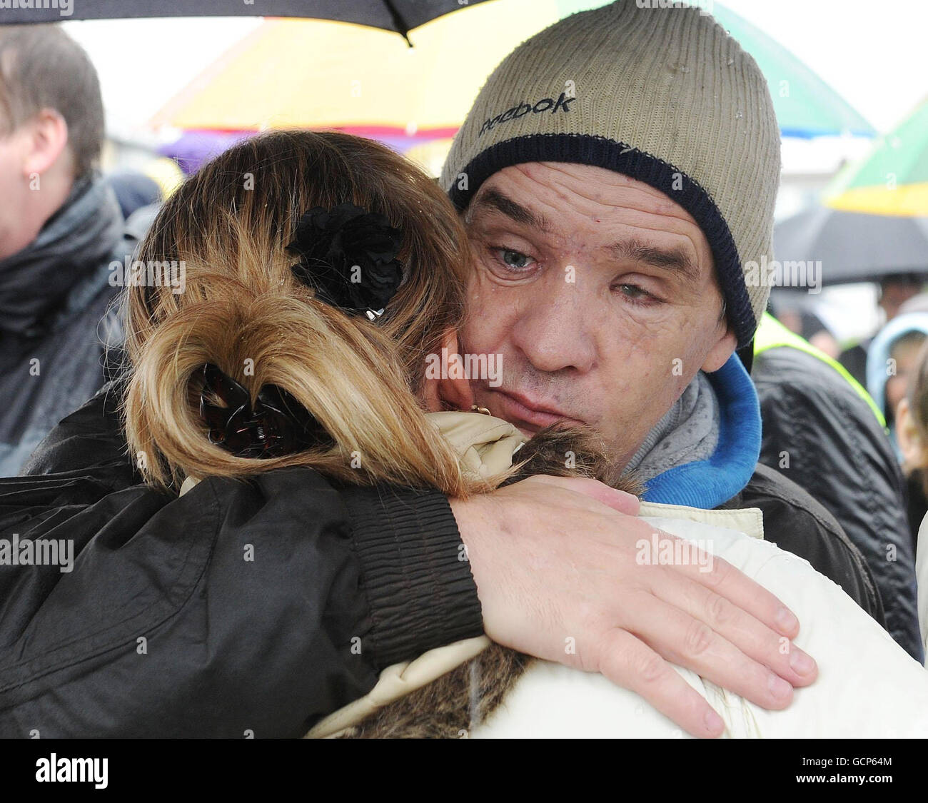 Pc David Rathband hugs an unidentified woman in Seaton Sluice, the ...