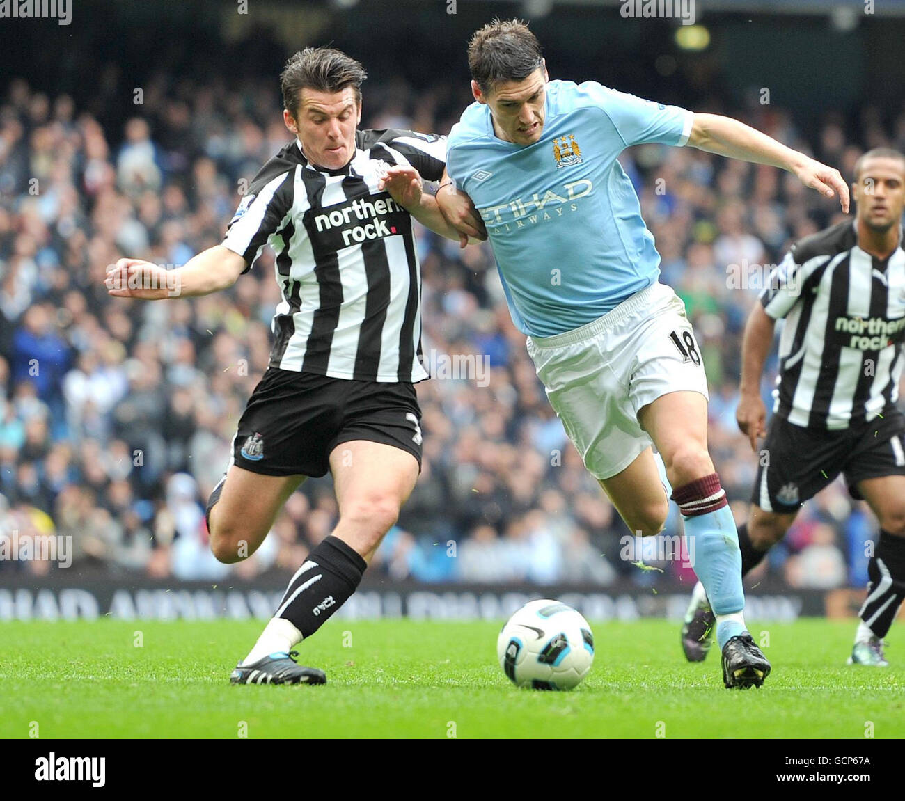 Manchester City's Gareth Barry and Newcastle United's Joey Barton (left ...