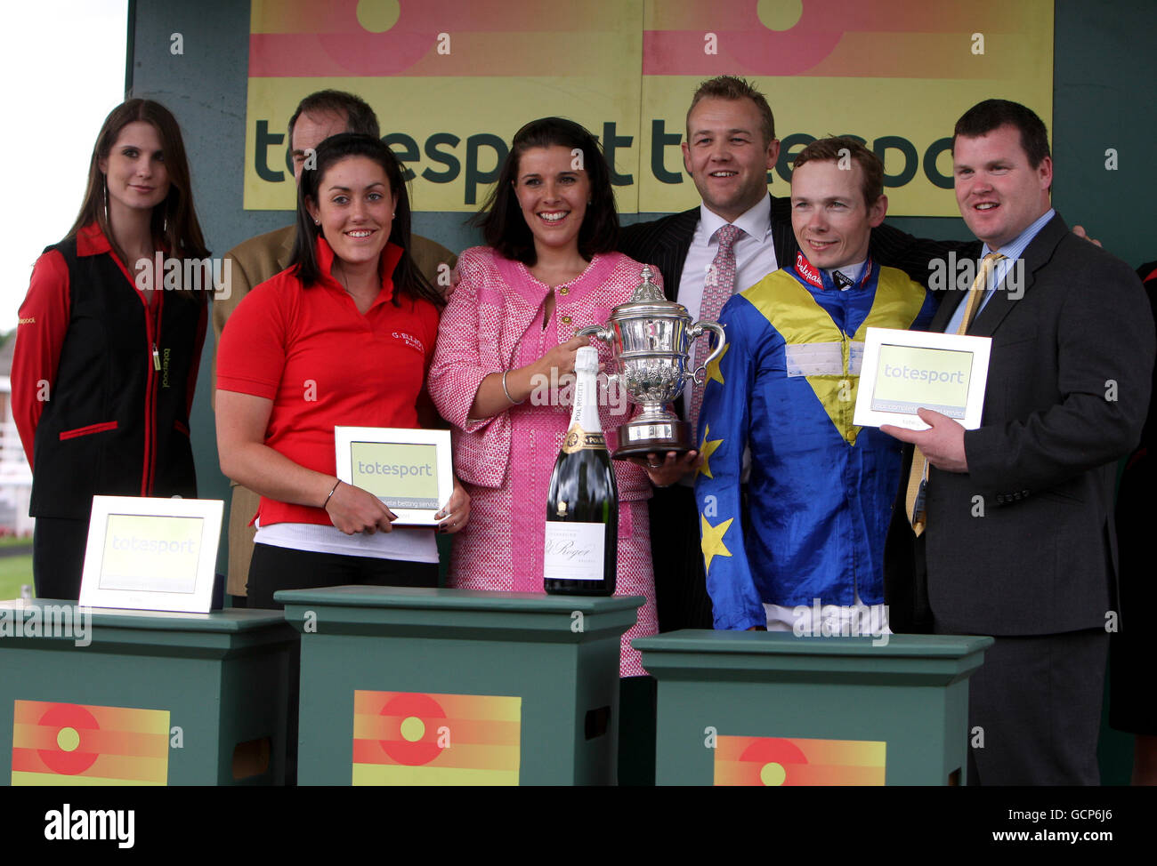 Jockey Jamie Spencer (second right), trainer Gordon Elliott (right) and ...