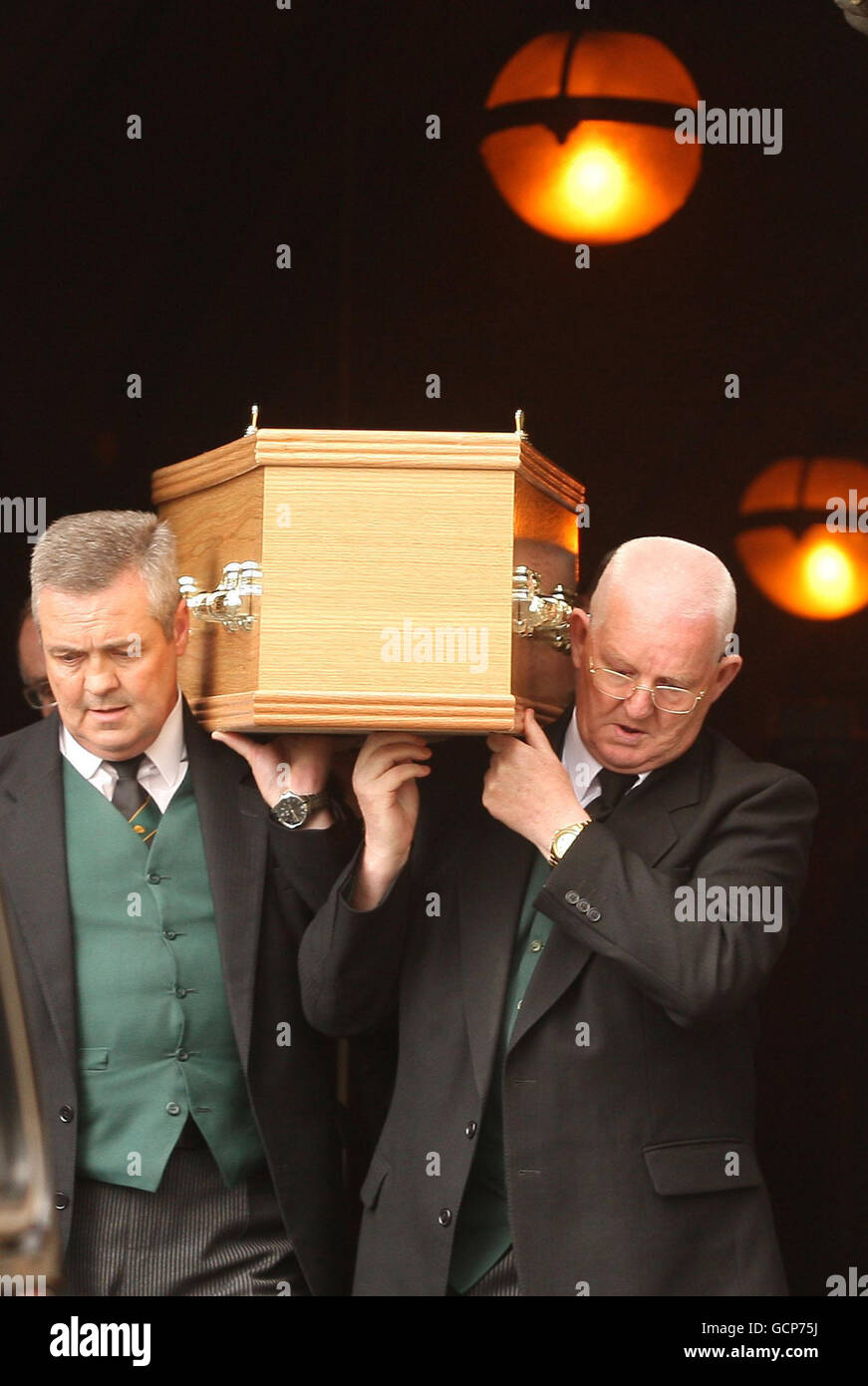 The coffin of Edwin Morgan, Scotland's first national poet, is carried ...