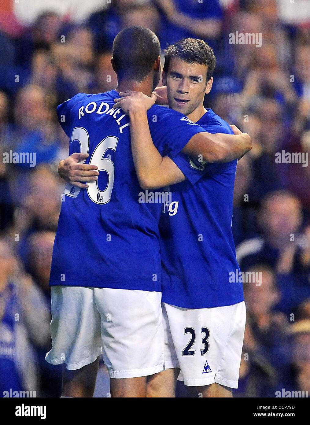 Everton's Jack Rodwell (left) celebrates after scoring his side's first ...