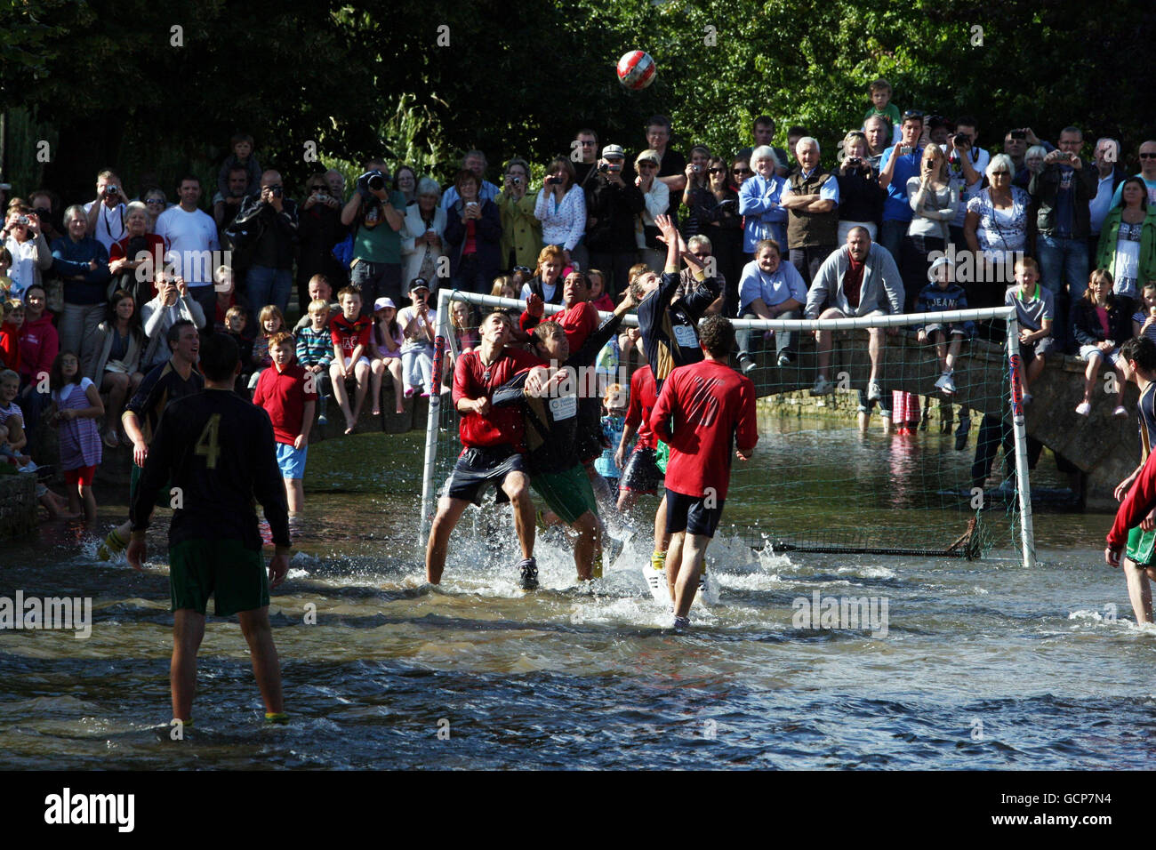 River Windrush football game Stock Photo - Alamy