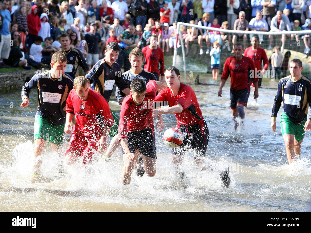 River Windrush football game Stock Photo - Alamy