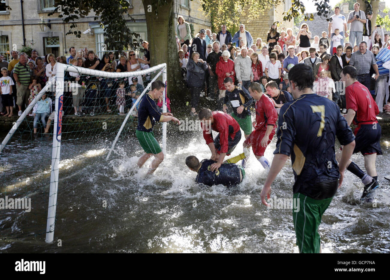 River Windrush football game Stock Photo - Alamy