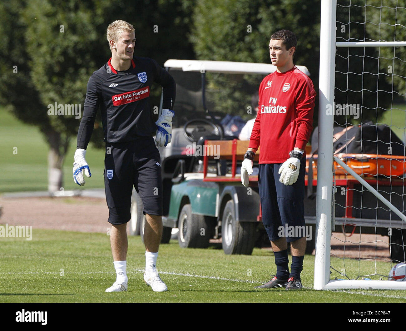 England goalkeeper Joe Hart (left) and Arsenal's James Shea during the ...