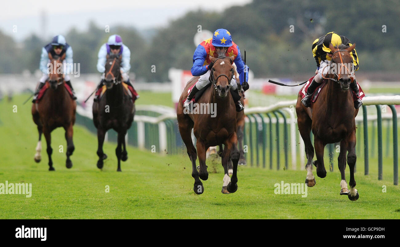 Singapore Lilly ridden by Chris Catlin (centre, star cap) beats ...