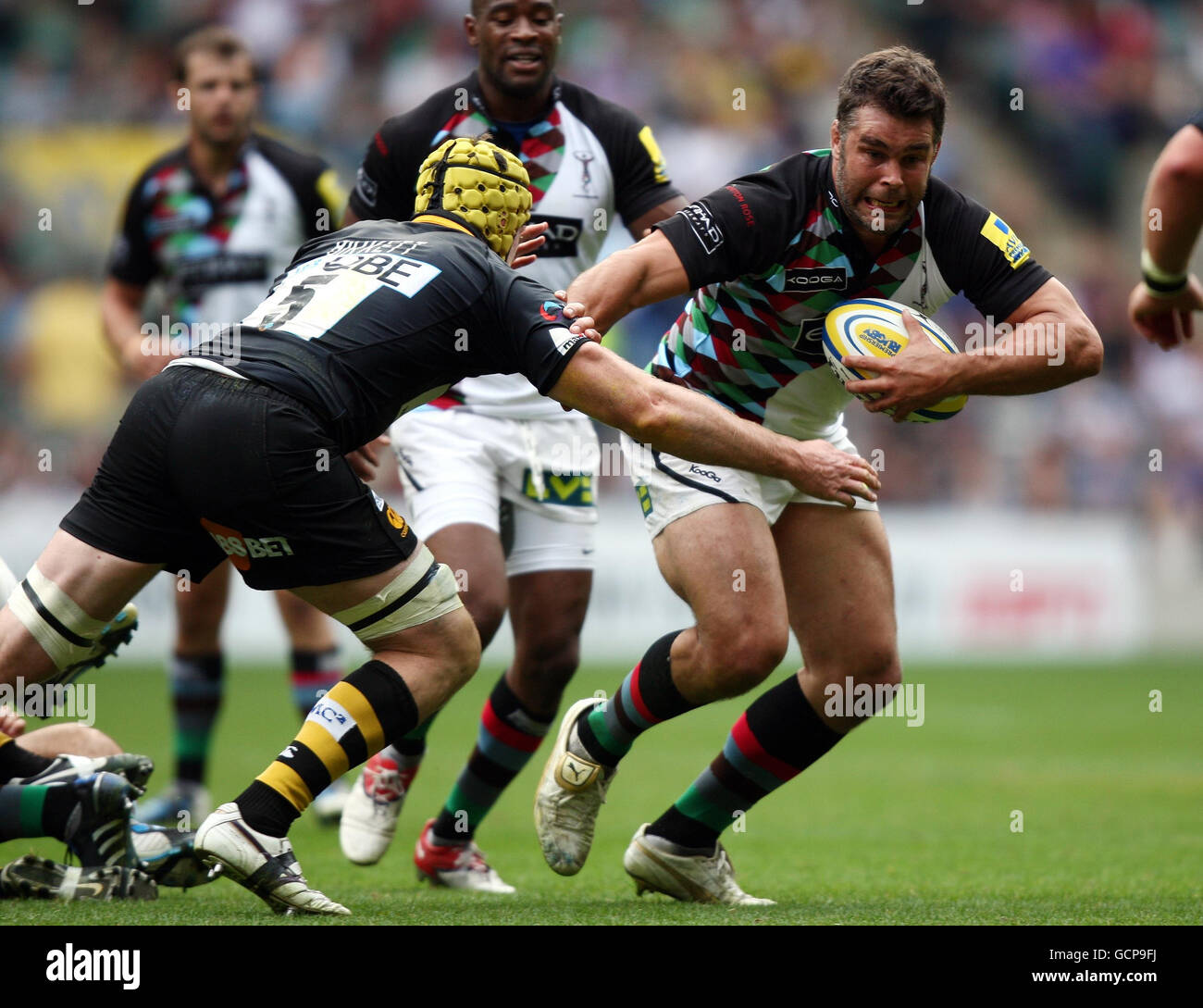 Rugbyu wasps rugbyu wasps full length tackling mangsm hi-res stock ...