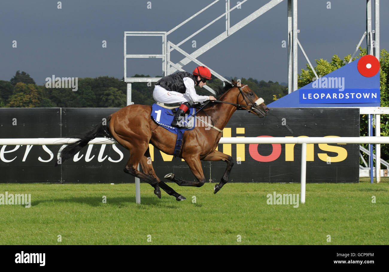 Jockey Pat Smullen rides A Word Apart to victory in the Irish Stallion ...