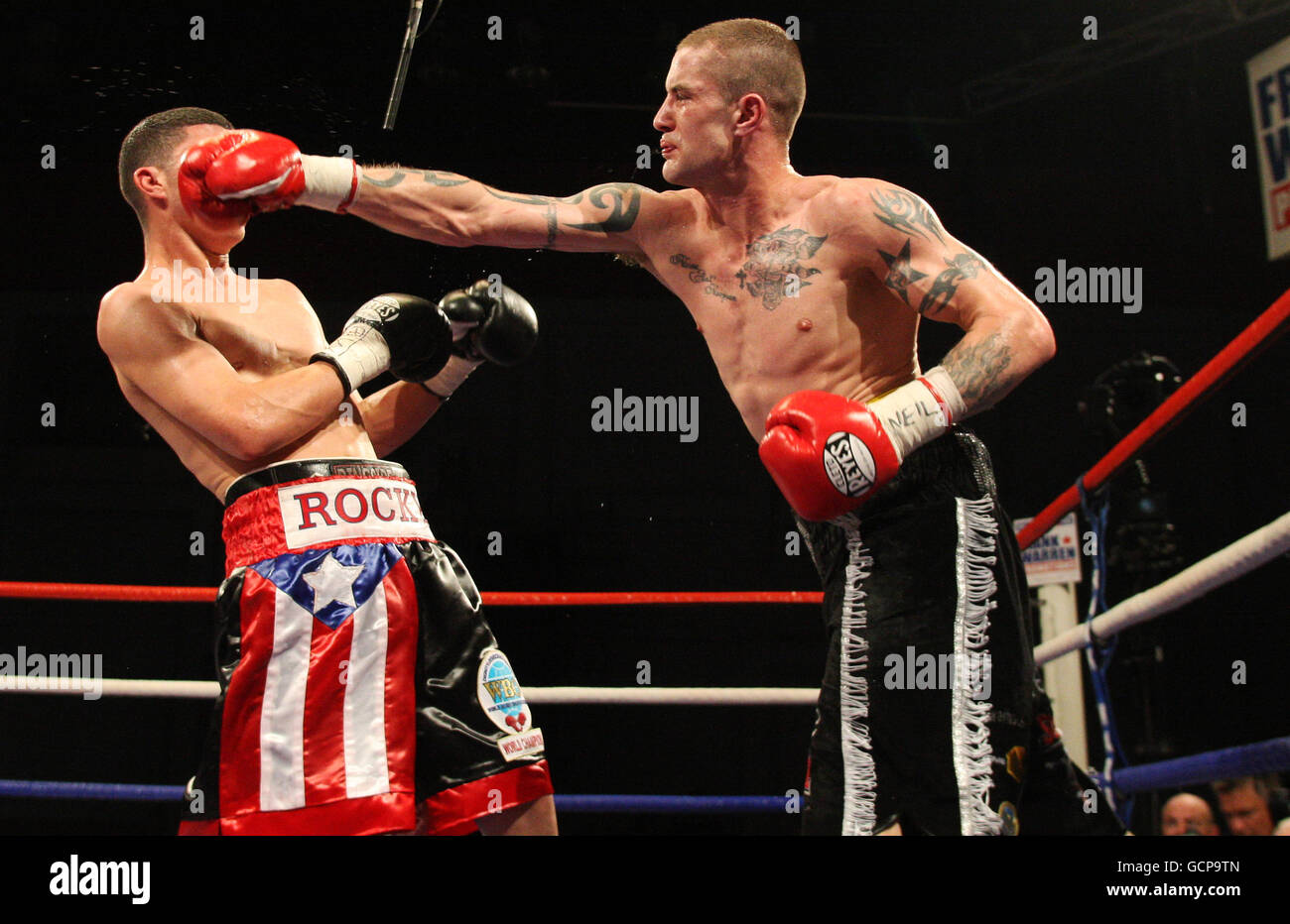 Scotland's Ricky Burns and Puerto Rico's Roman Martinez (left) during ...