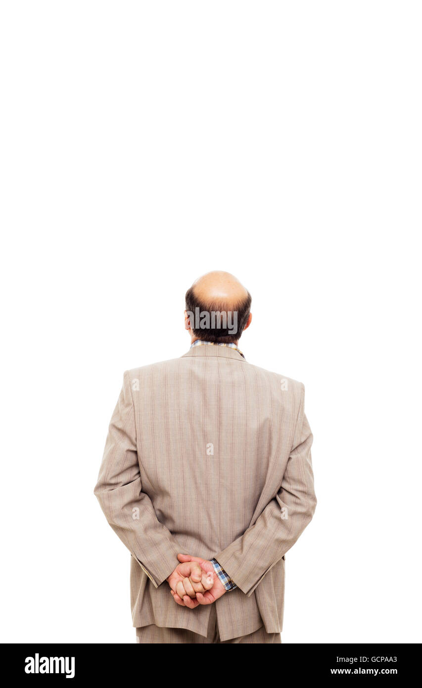 man in the suit turned his back, taking thoughtfully his wrist Stock ...
