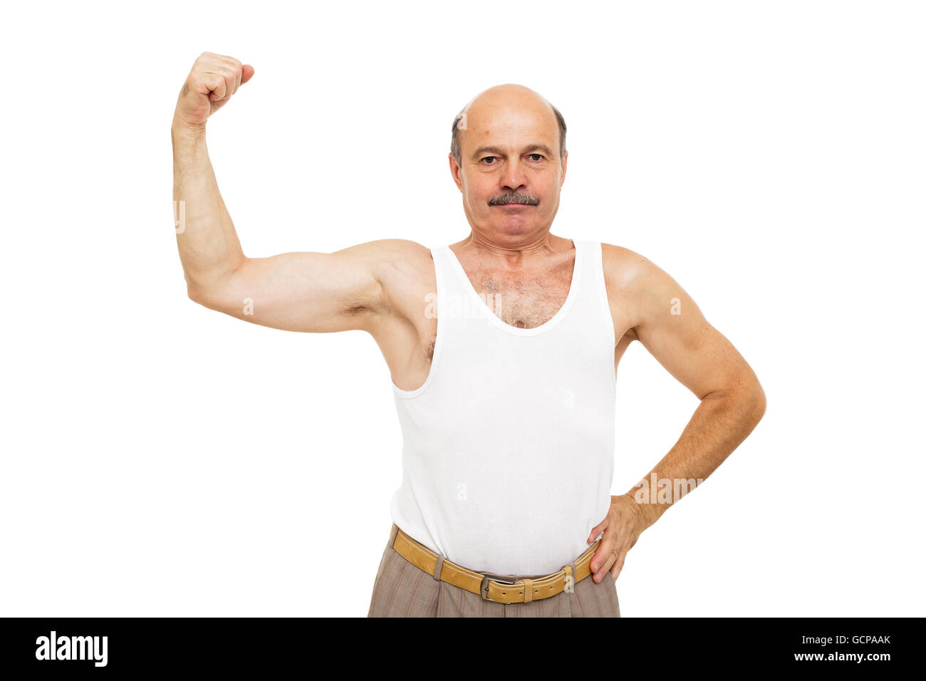 Elderly man shows muscles. keep fit by exercise Stock Photo - Alamy