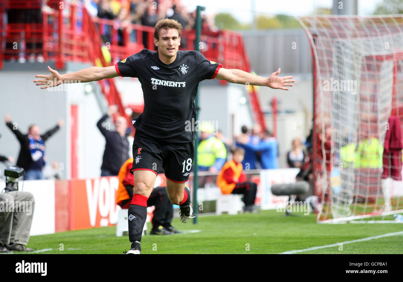 Rangers' Nikica Jelavic celebrates scoring the opening goal during the ...