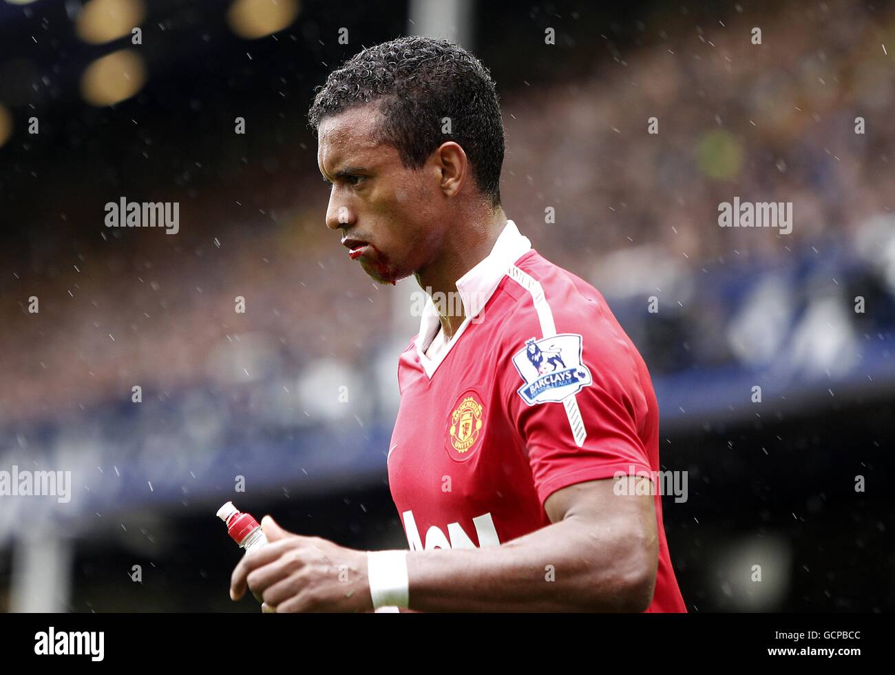Manchester United's Luis Nani suffers a facial injury Stock Photo - Alamy
